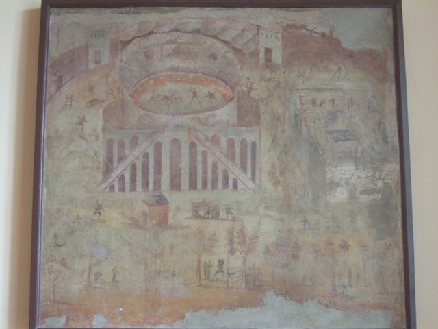 I.3.23 Pompeii. Rear wall of the peristyle. Painting of “Riot in the ...