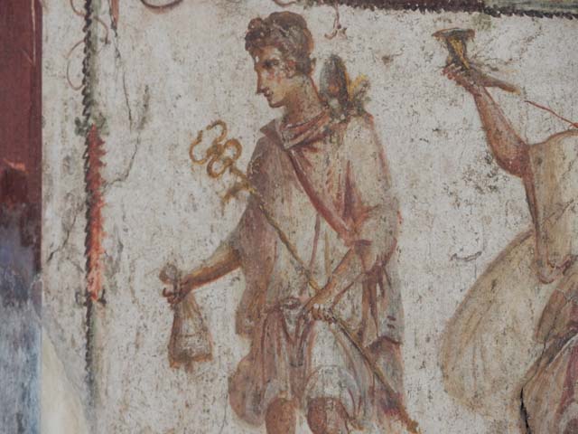 I.8.8 Pompeii. May 2015. Detail of painted figure of a Lar. Photo ...