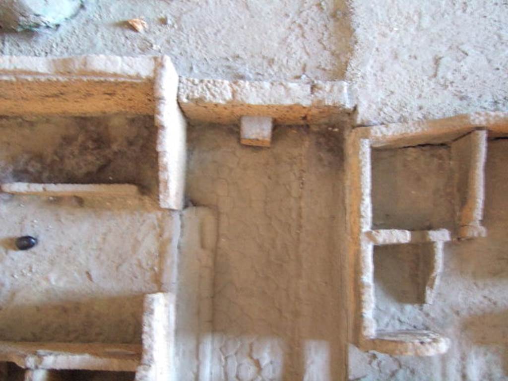 Street altar in the centre of the wall at the north end of the Via di ...